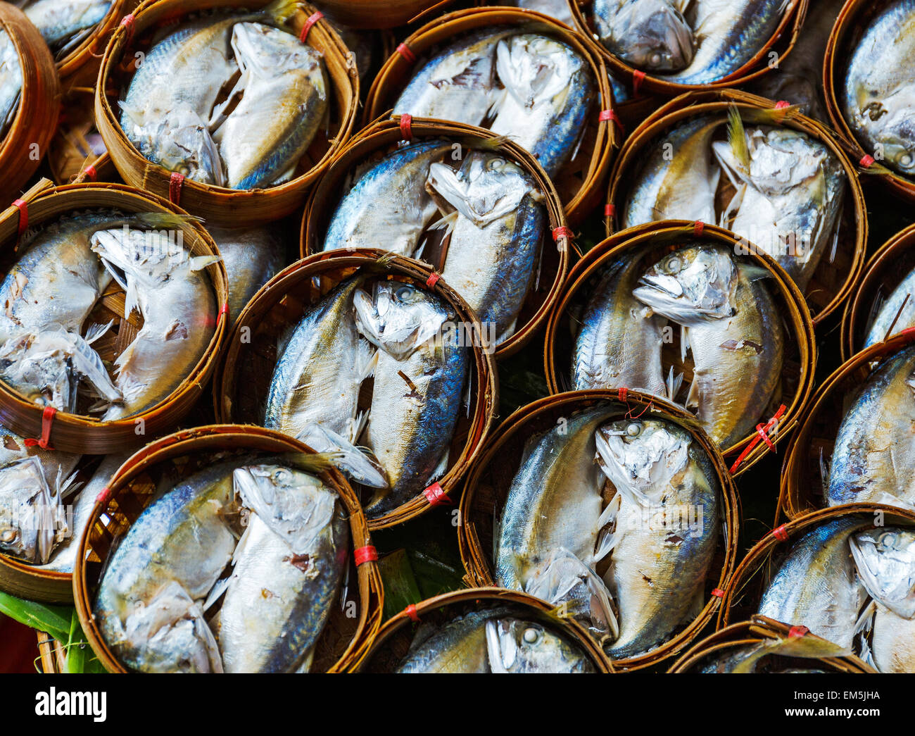 Fish in barrels for sell at market Stock Photo - Alamy