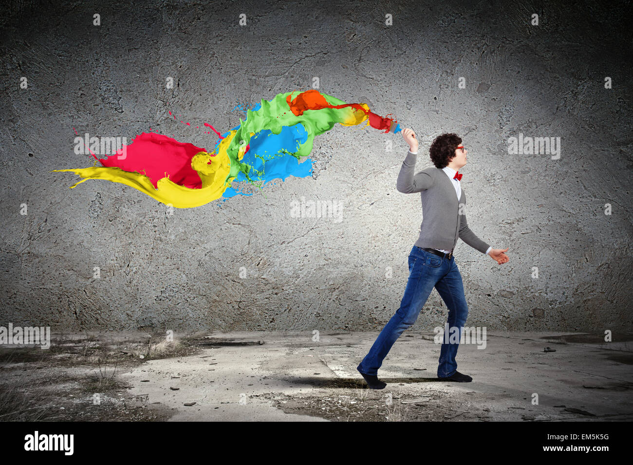 Young man and colour splash Stock Photo - Alamy