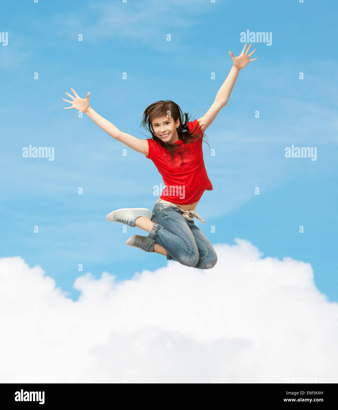 smiling girl jumping Stock Photo - Alamy