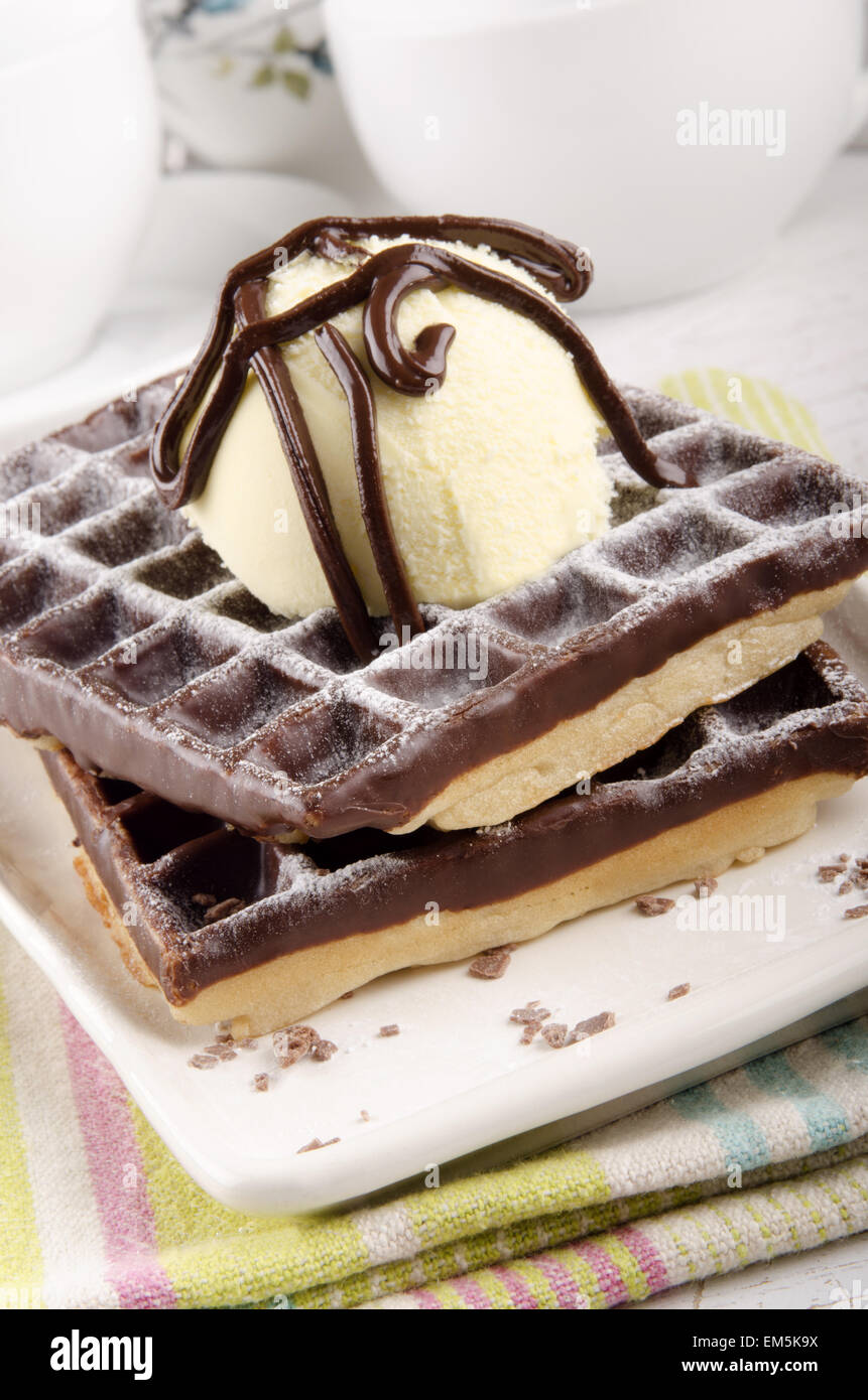 chocolate waffle with powdered sugar Stock Photo - Alamy