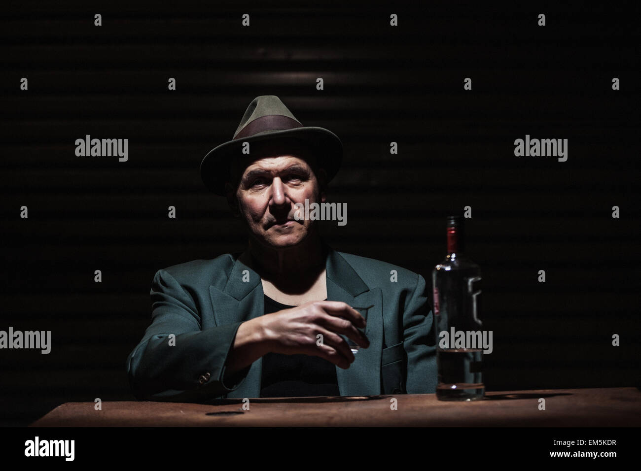 Sad man drinking vodka hi-res stock photography and images - Alamy
