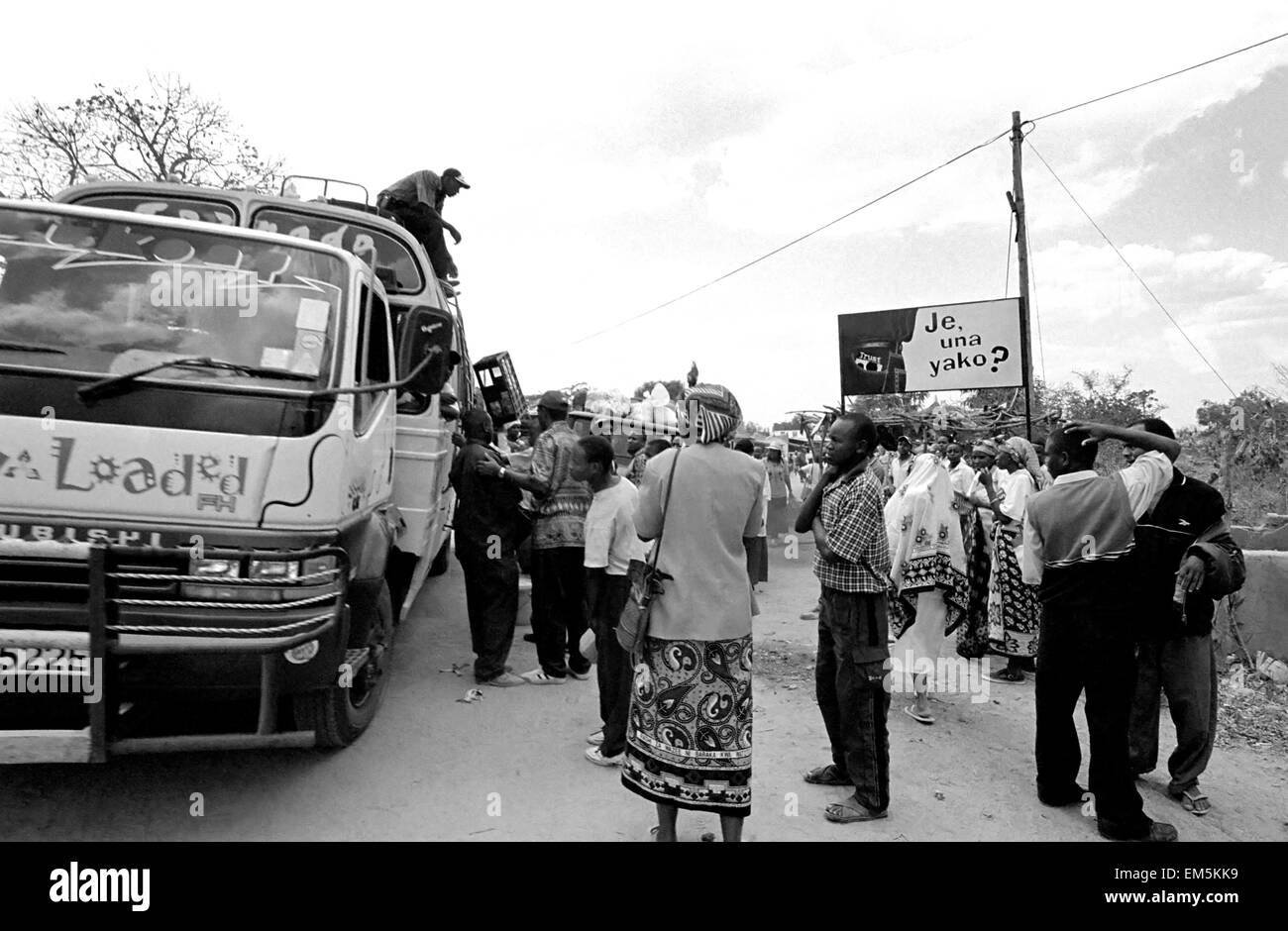 Bus station of matatus of Ikutha, Kitui, Kenya. One ad says: "You ...