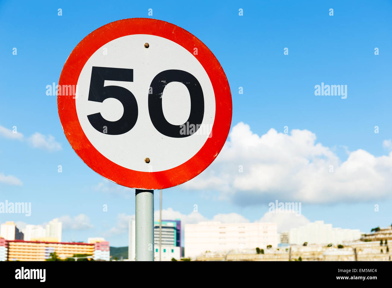 Road sign 50 blue sky background Stock Photo - Alamy