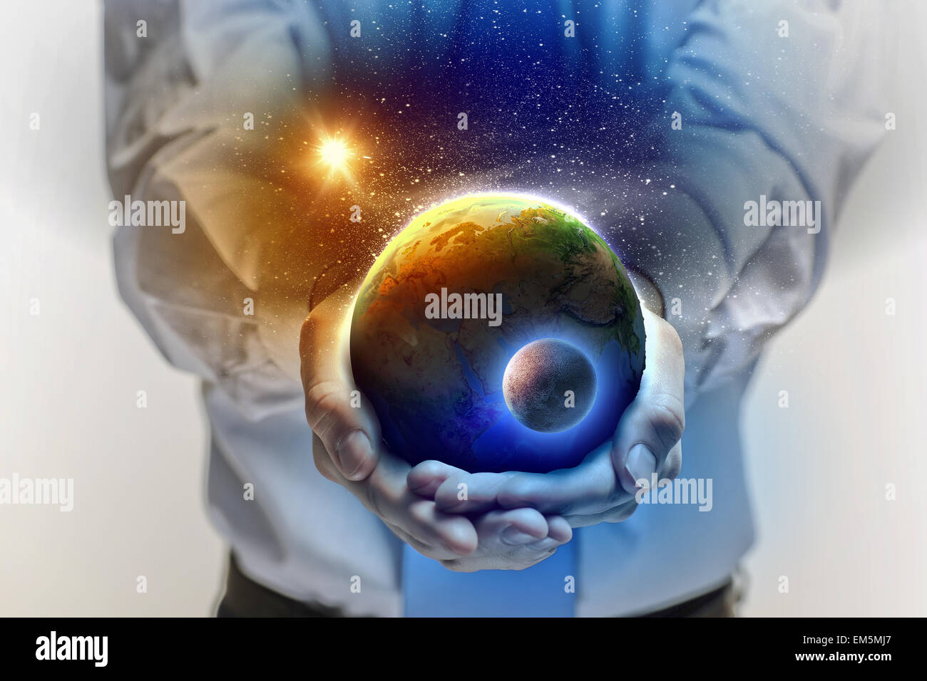 Earth planet in hands Stock Photo - Alamy