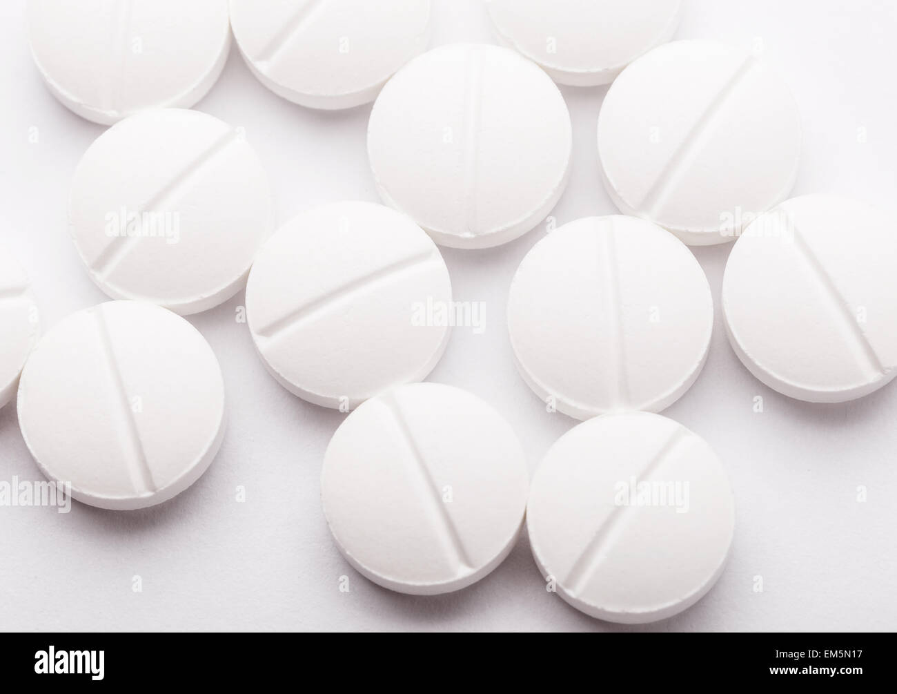 White drugs on white background Stock Photo - Alamy