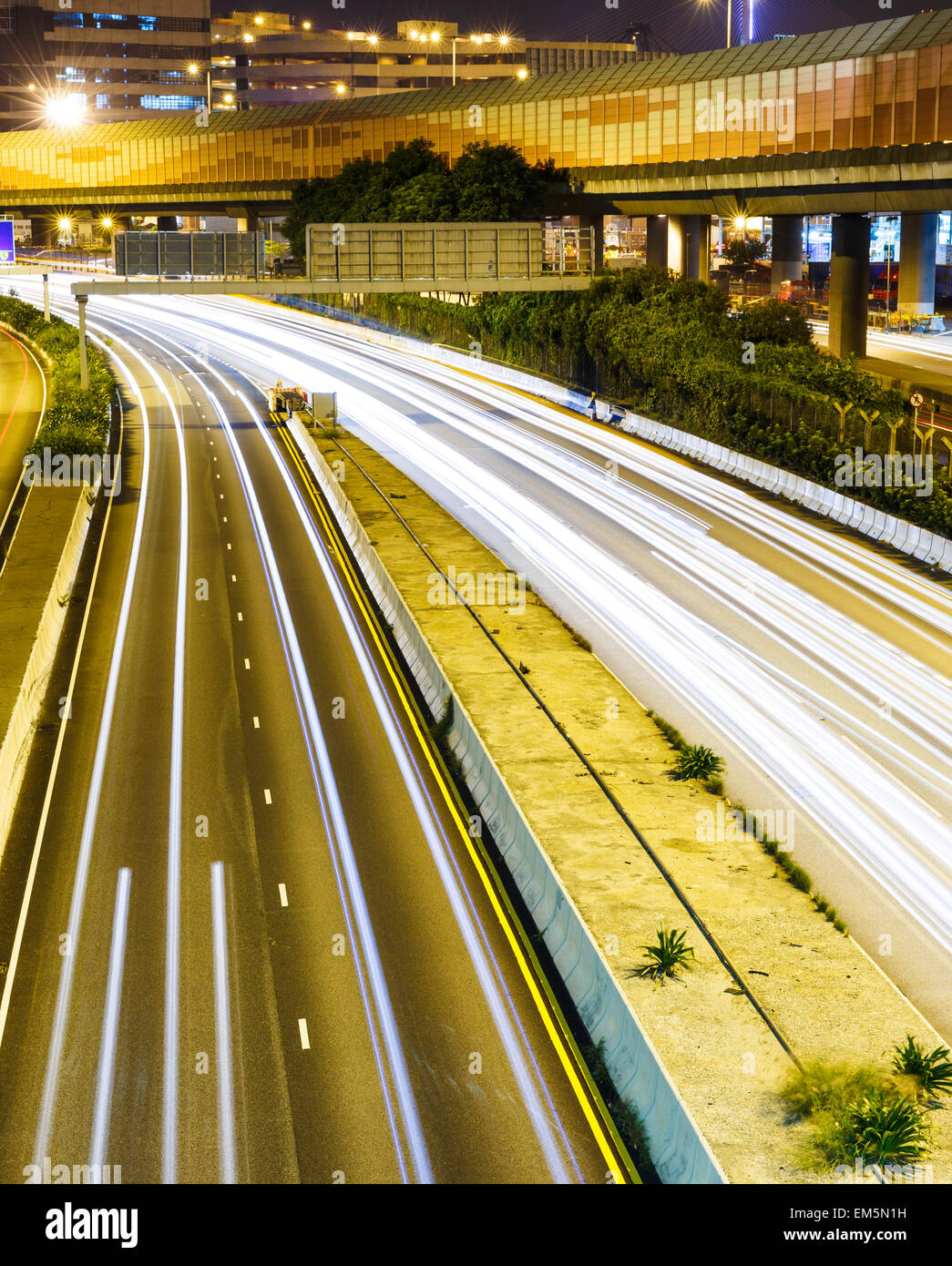 Busy traffic on highway at night Stock Photo - Alamy
