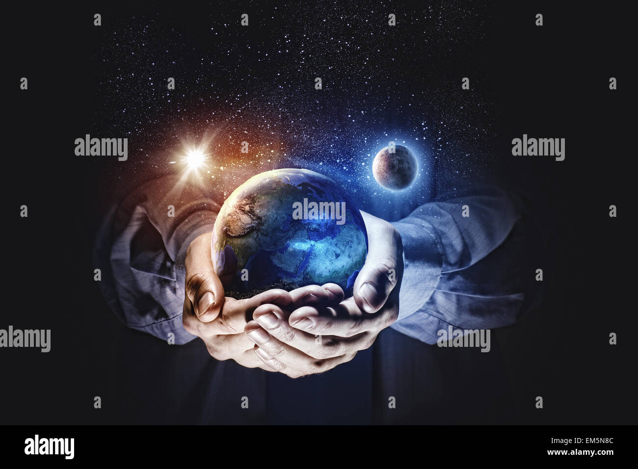 Earth planet in hands Stock Photo - Alamy