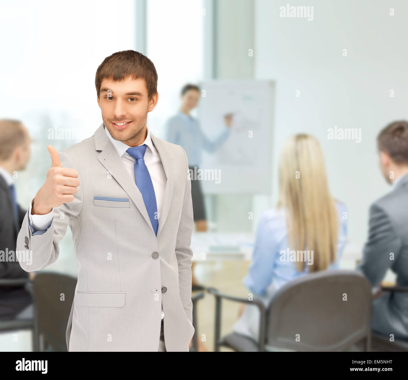 businessman showing thumbs up Stock Photo - Alamy