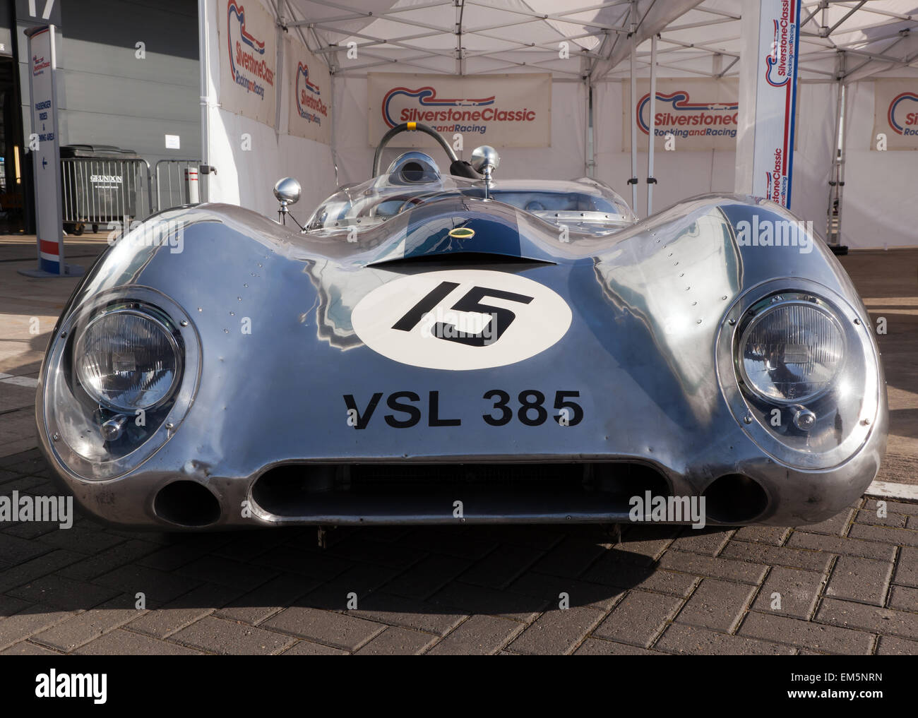 Front view of a classic silver lotus XV, race car ouside the ...