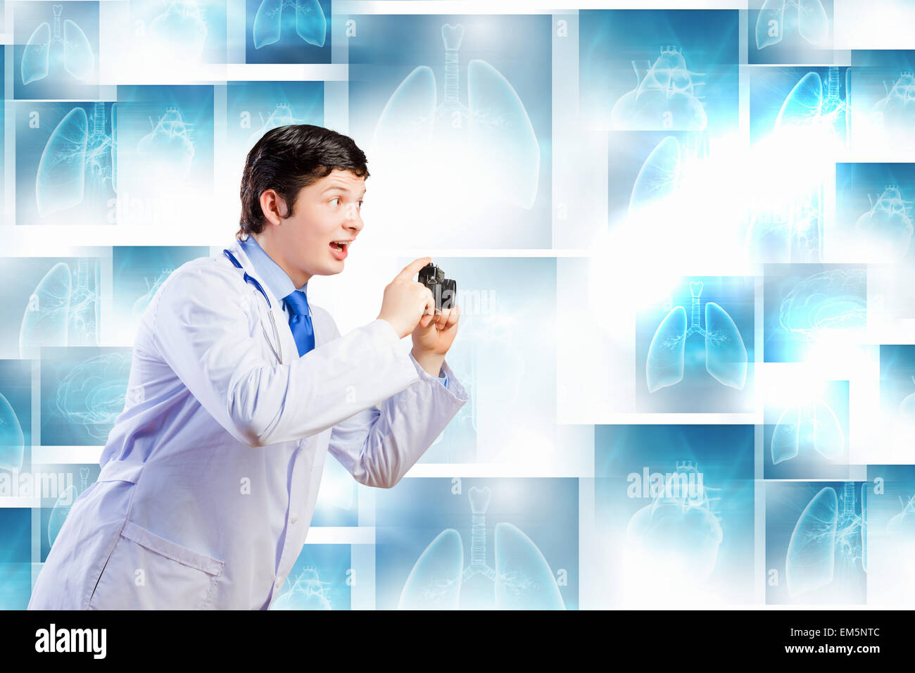 Doctor with photo camera Stock Photo - Alamy