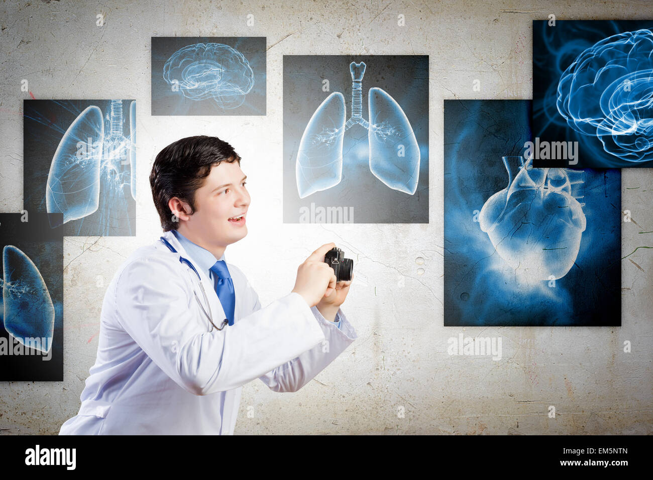 Doctor with photo camera Stock Photo - Alamy