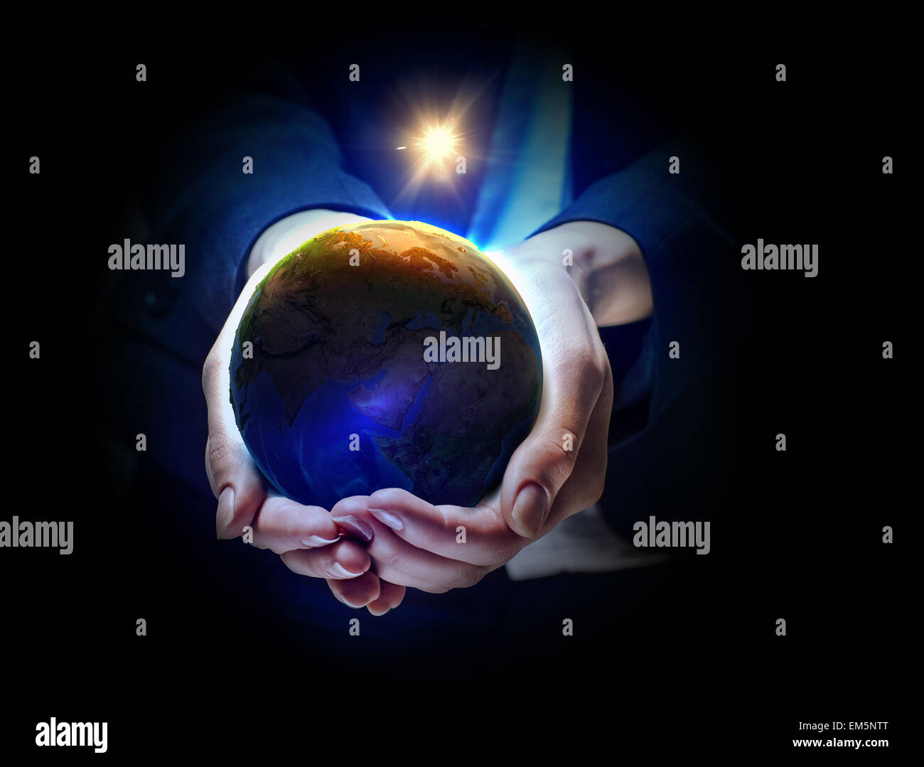 Earth planet in hands Stock Photo - Alamy