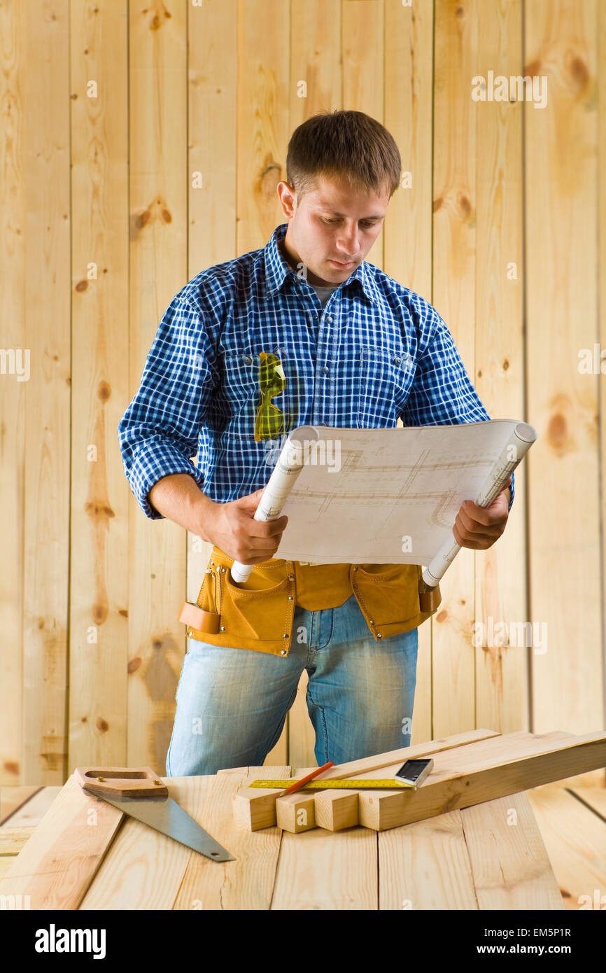 carpenter with blueprint Stock Photo - Alamy