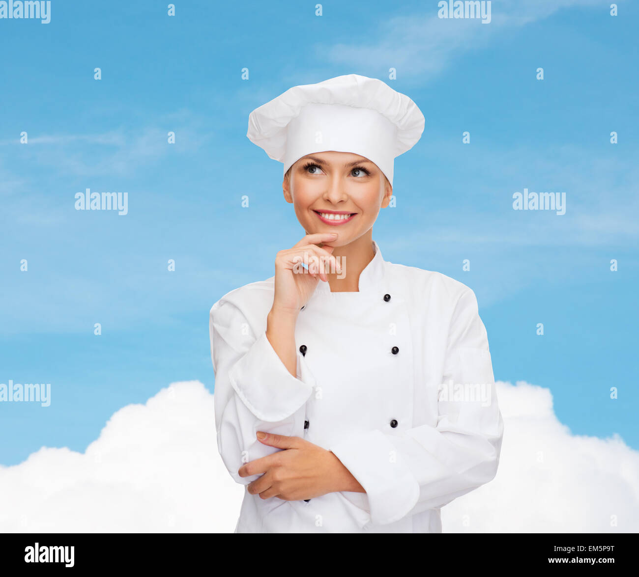 smiling female chef dreaming Stock Photo - Alamy