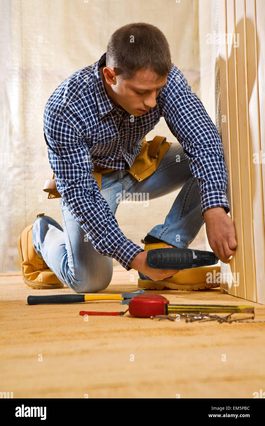 single man work in the wooden room Stock Photo - Alamy
