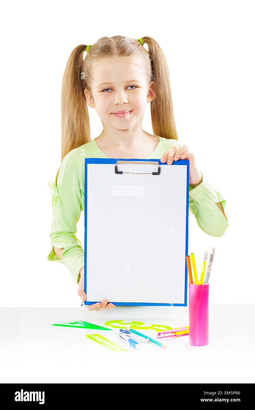 a schoolgirl holding paperclip near table Stock Photo - Alamy