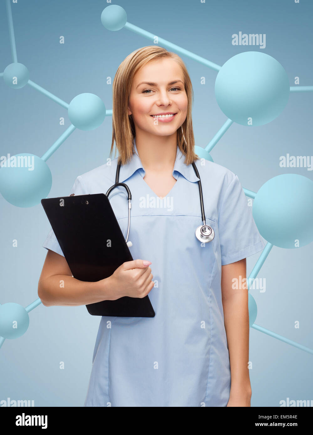 smiling female doctor or nurse with clipboard Stock Photo - Alamy