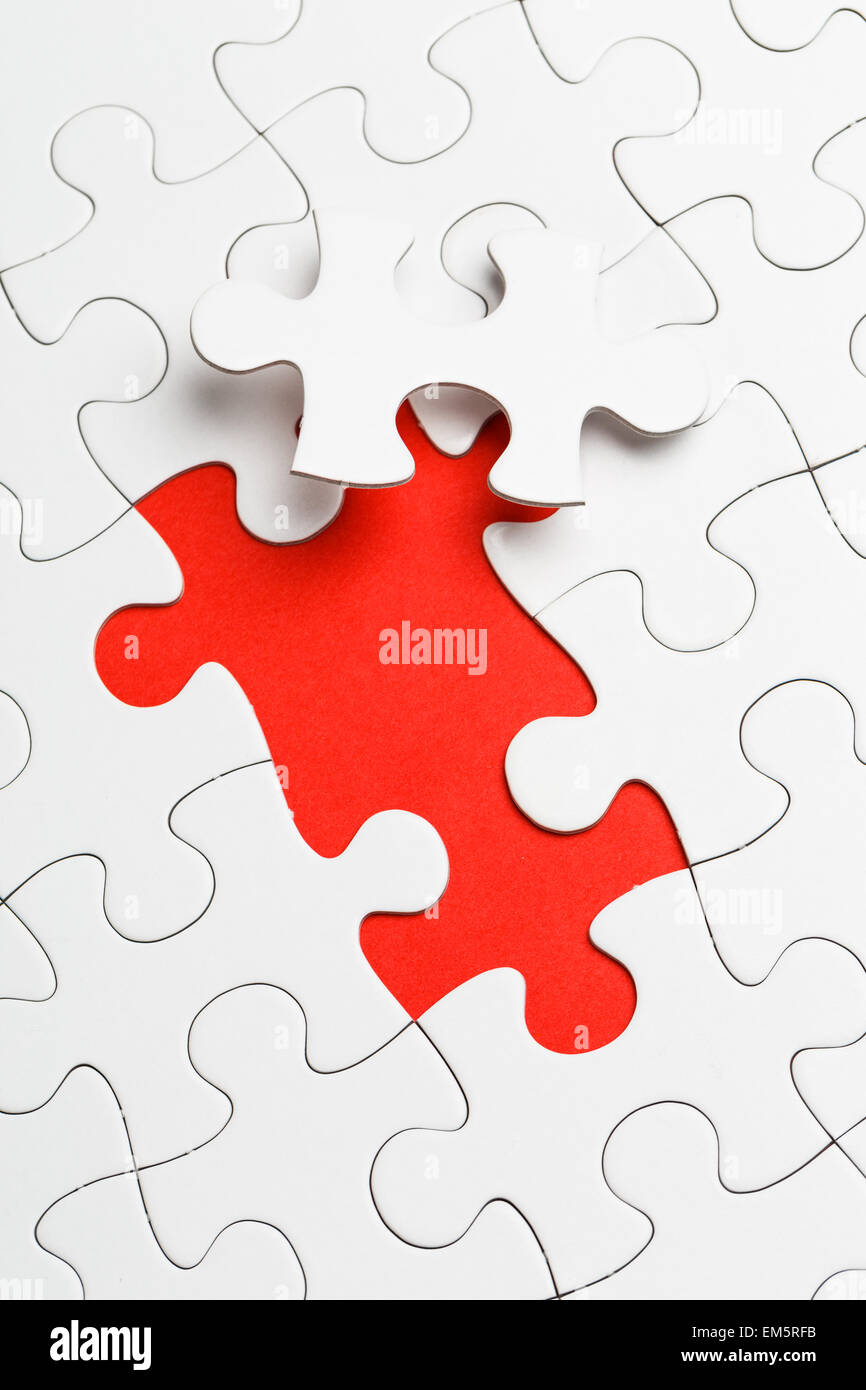 Incomplete puzzle with missing piece Stock Photo - Alamy