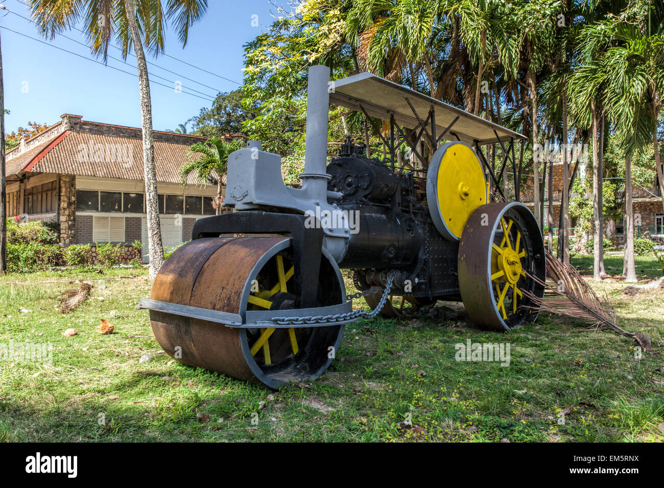 Yellow steam roller at the closed sugar mill at Camilo Cienfuegos in a ...