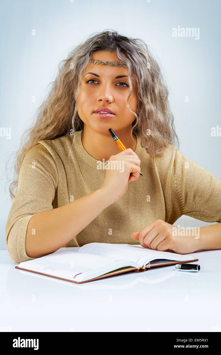 beautyful young female thinking Stock Photo - Alamy