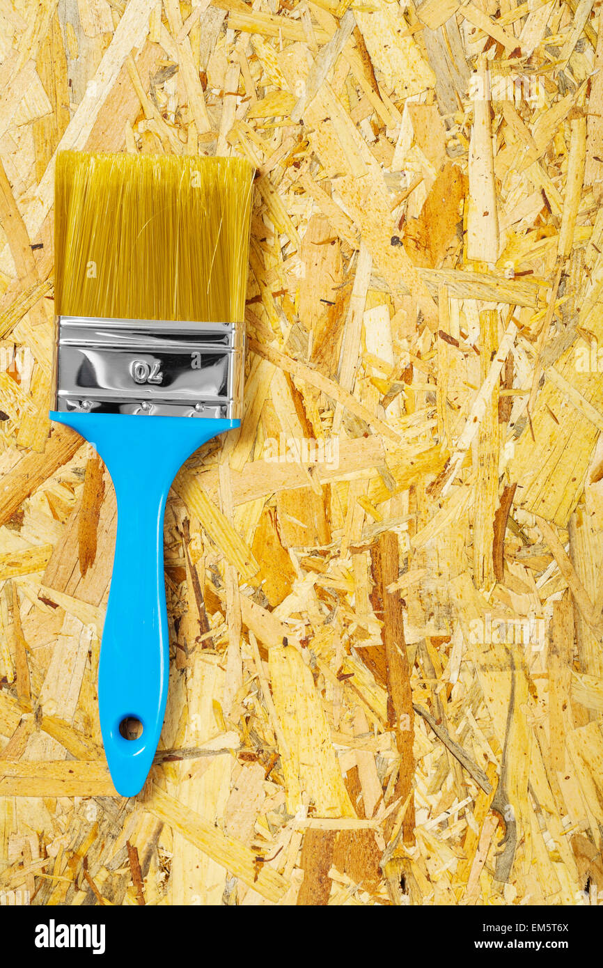single paintbrush on plywood Stock Photo - Alamy