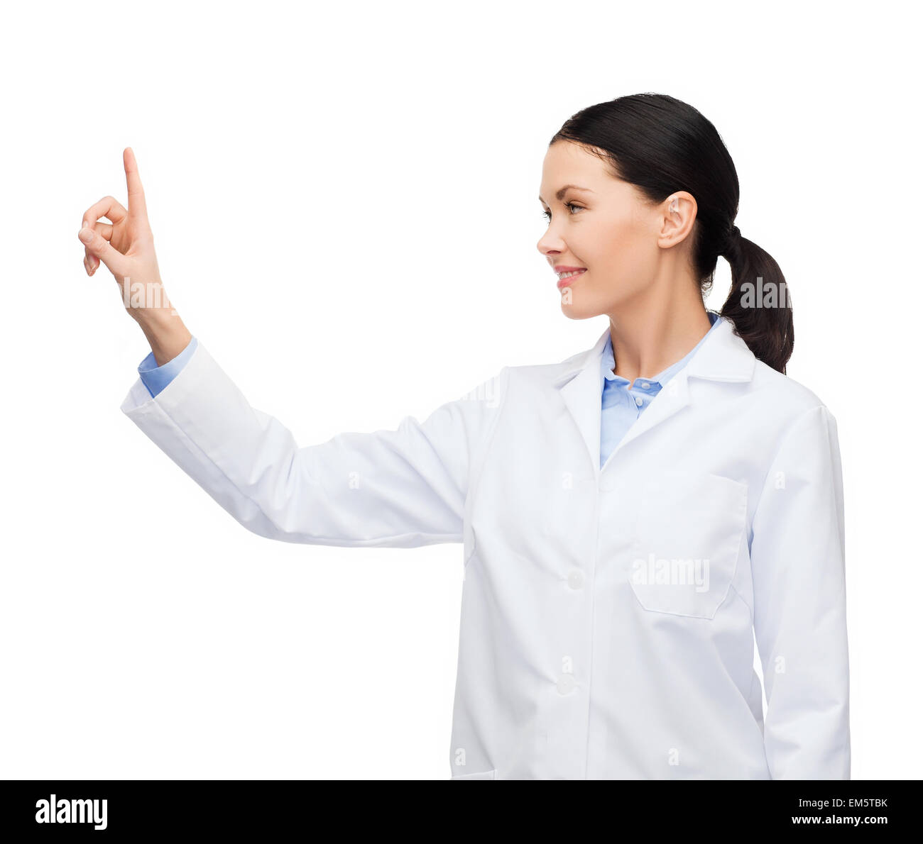 smiling female doctor pointing to something Stock Photo - Alamy