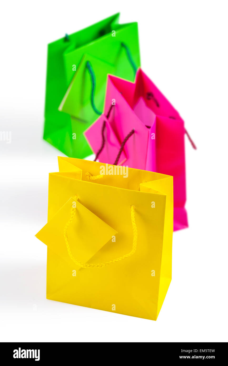 three colored isolated paper bags Stock Photo - Alamy