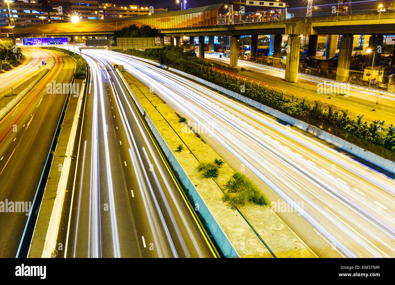 Busy traffic on highway at night Stock Photo - Alamy