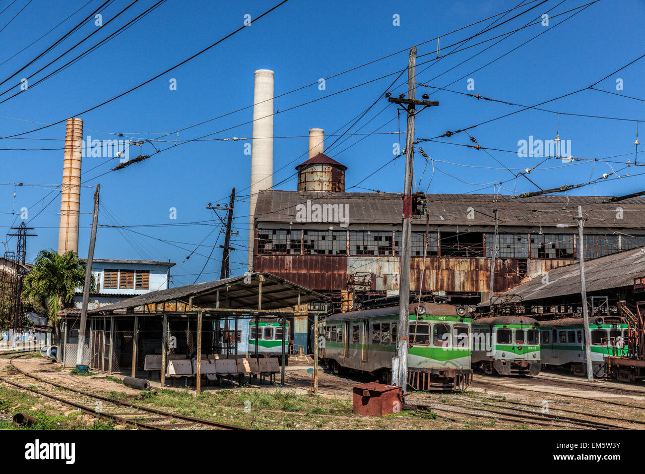 Old rail carriages of a train at an abandoned closed sugar mill in a ...