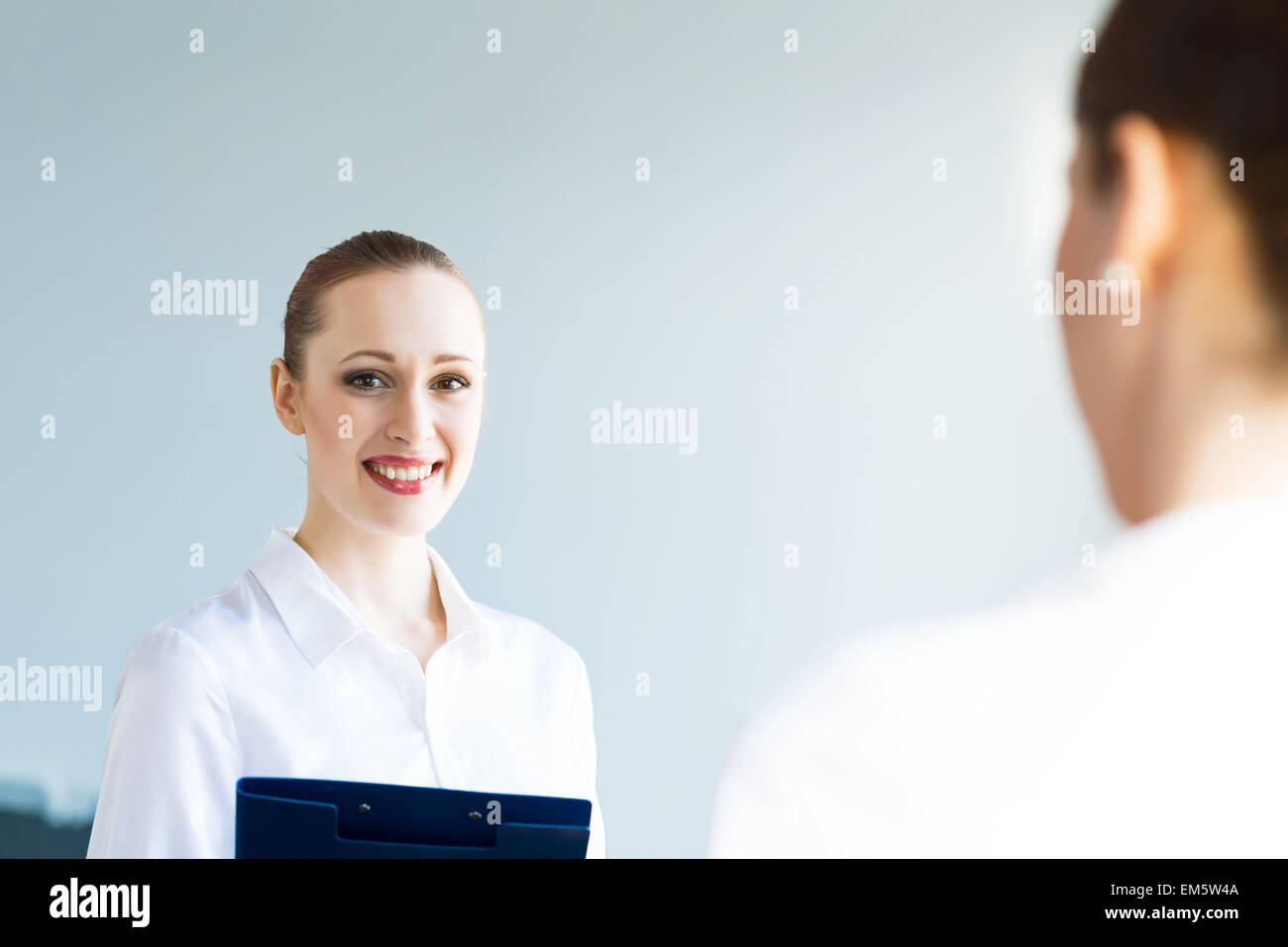 Young business woman Stock Photo - Alamy