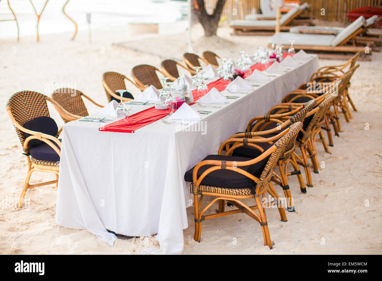 Summer empty open air table set for banquet on beach at sunset Stock ...