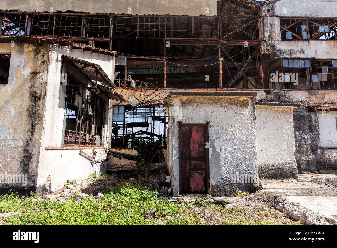 Part of the abandoned ruins of a closed sugar mill factory in Camilo ...