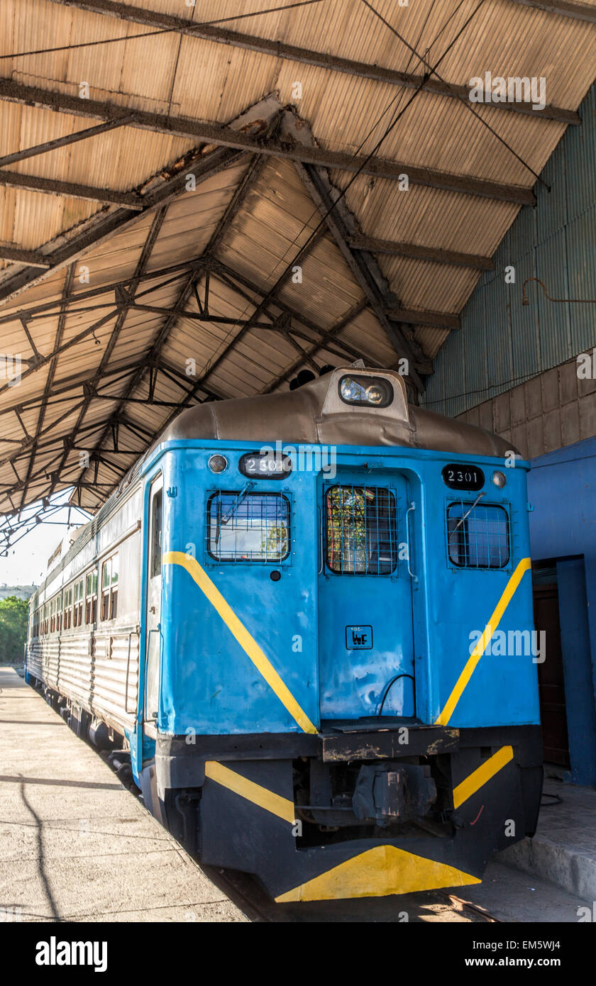 a Blue old diesel train at a railway station in a remote part of Cuba ...