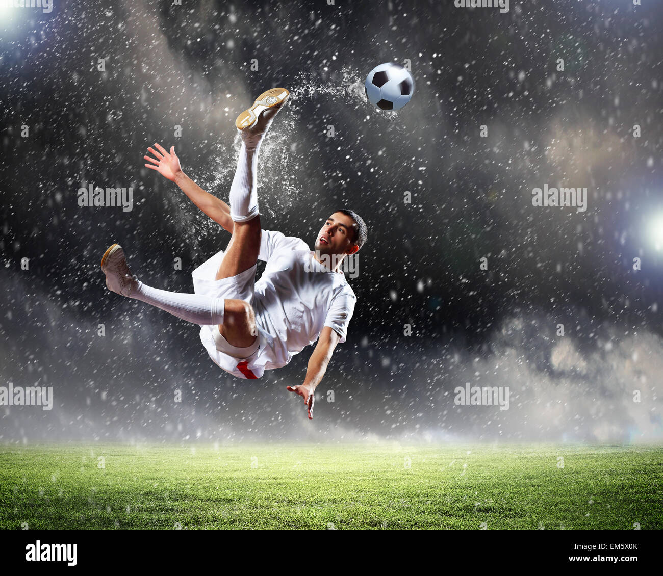 Football player stadium hitting ball hi-res stock photography and ...