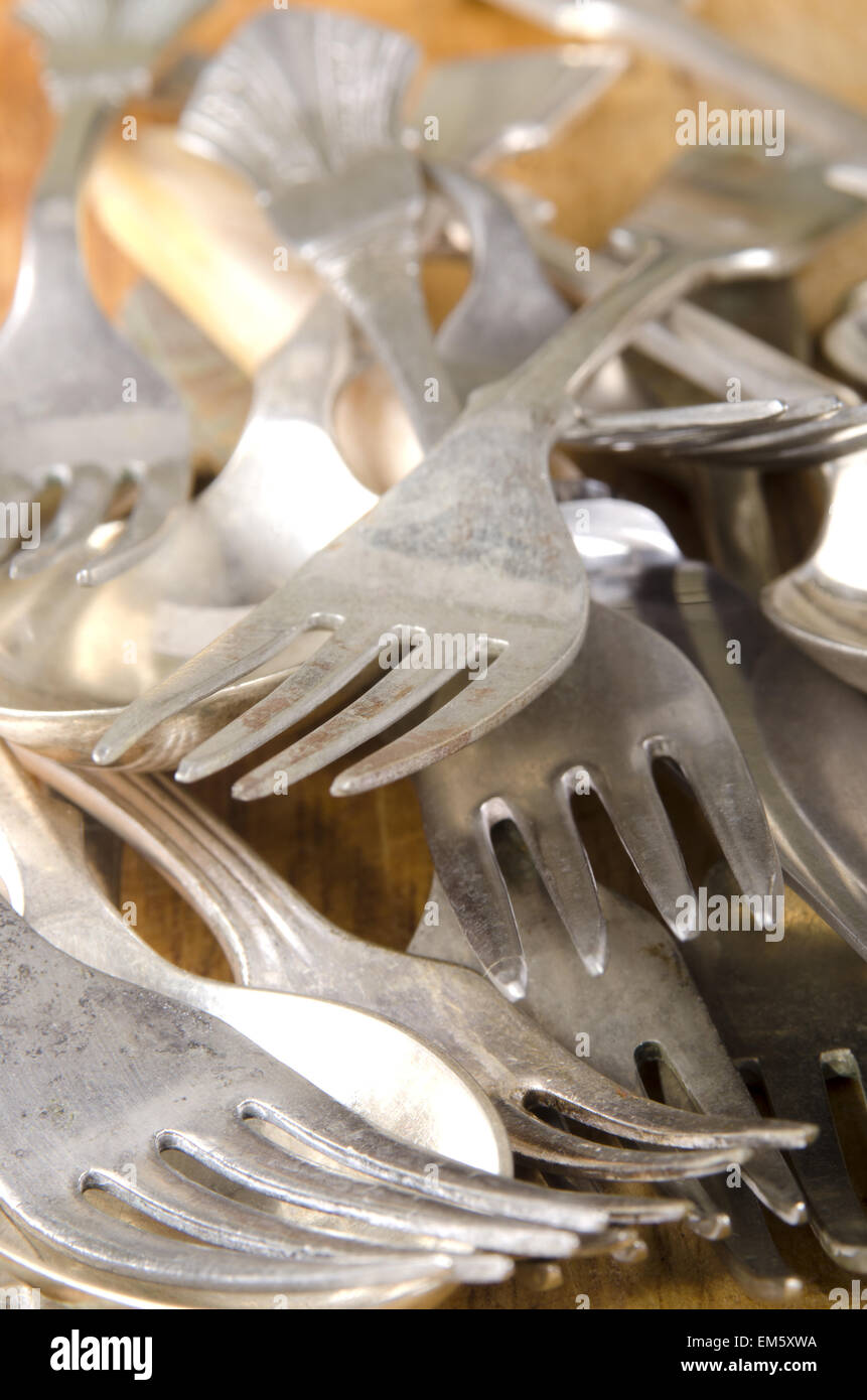 old fork on a wooden board Stock Photo - Alamy