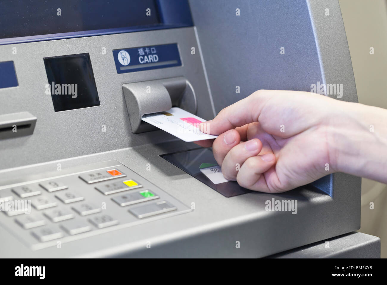 Hand taking money on ATM bank machine Stock Photo - Alamy