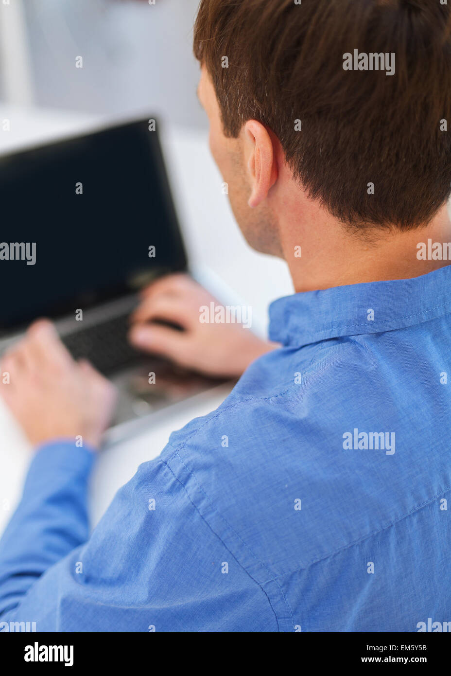 Man checking time using laptop hi-res stock photography and images - Alamy