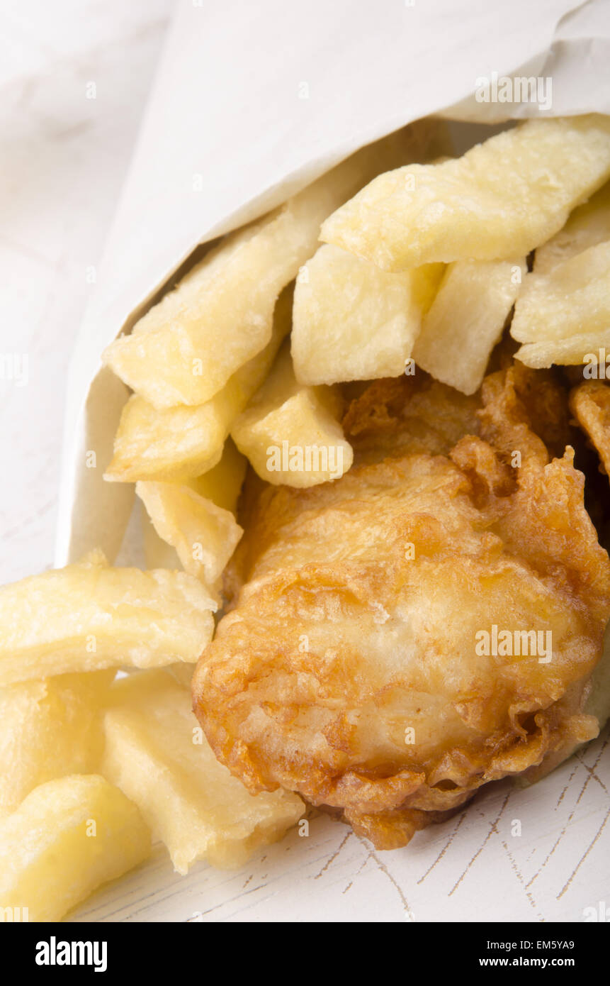 french fries and fish in a white bag Stock Photo - Alamy