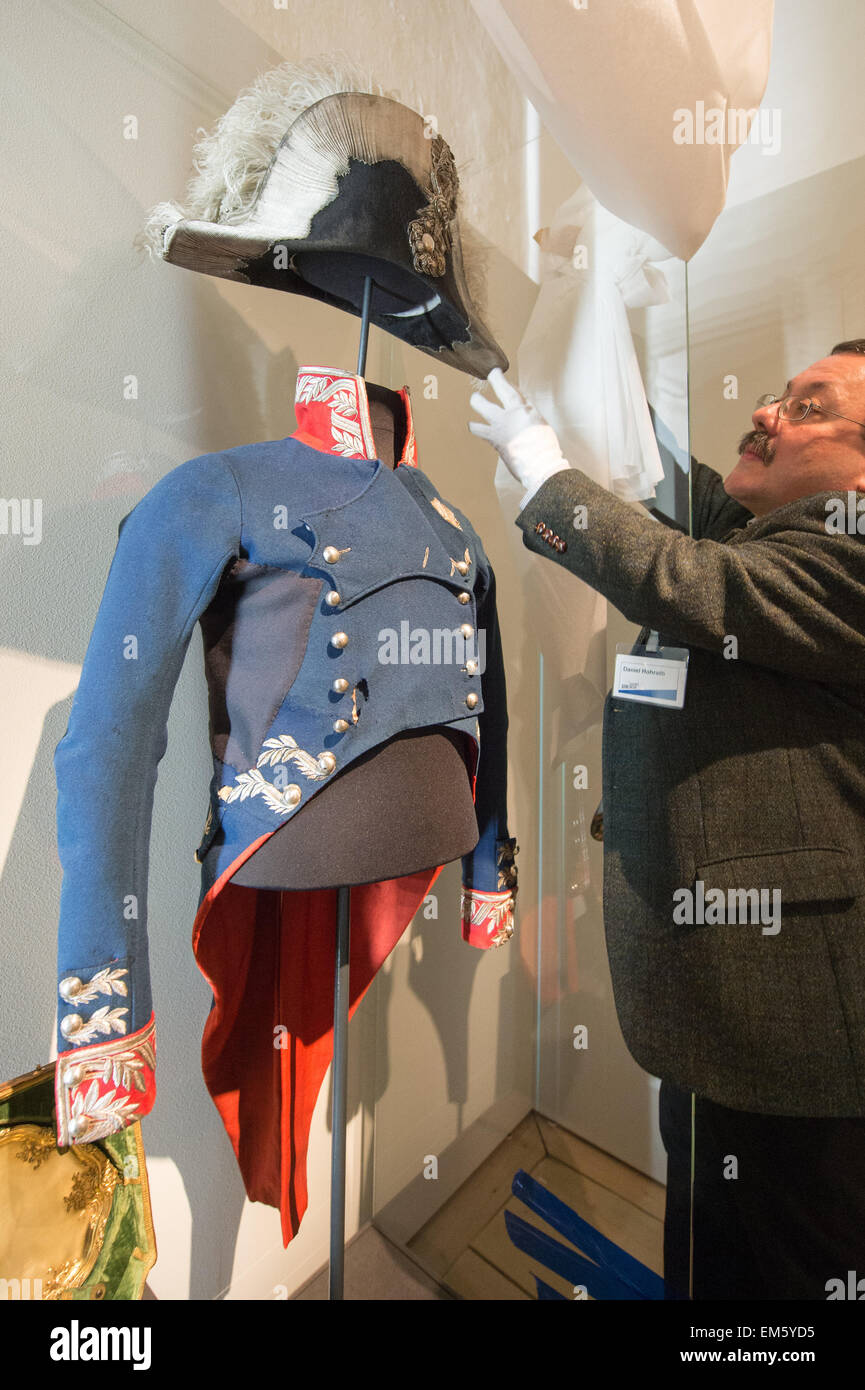 Ingolstadt, Germany. 16th Apr, 2015. A man works on a uniform of Carl ...