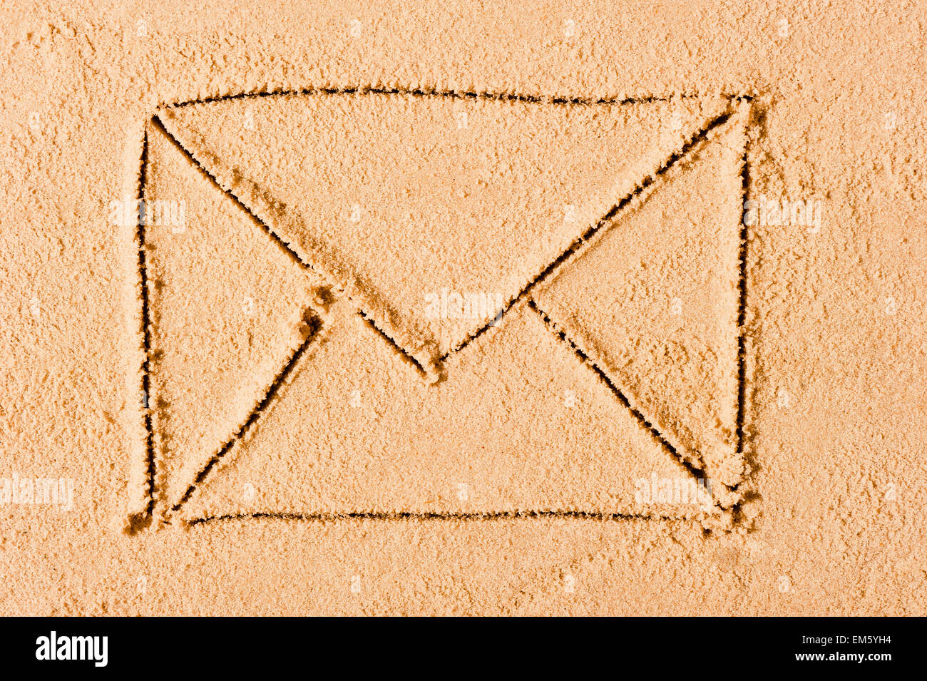 envelope is drawn on wet sand on the beach Stock Photo - Alamy