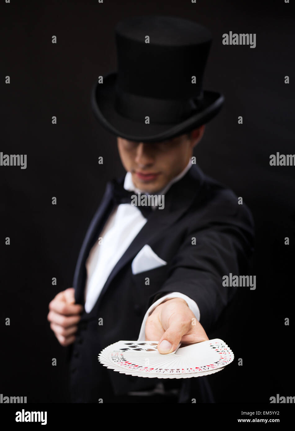 Magician giving cards hi-res stock photography and images - Alamy