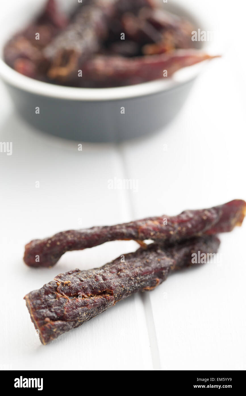 spice beef jerky on white table Stock Photo - Alamy