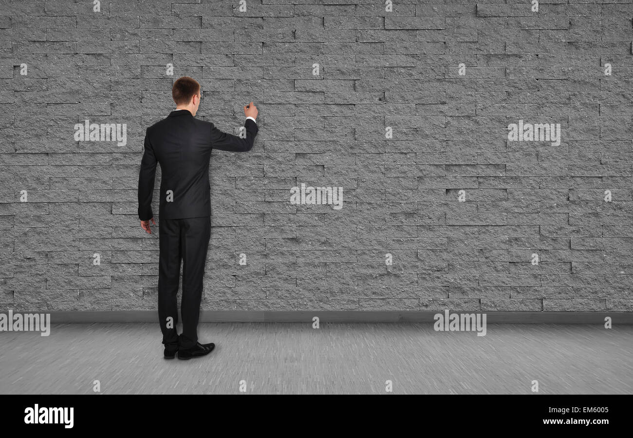 man drawing on wall Stock Photo - Alamy