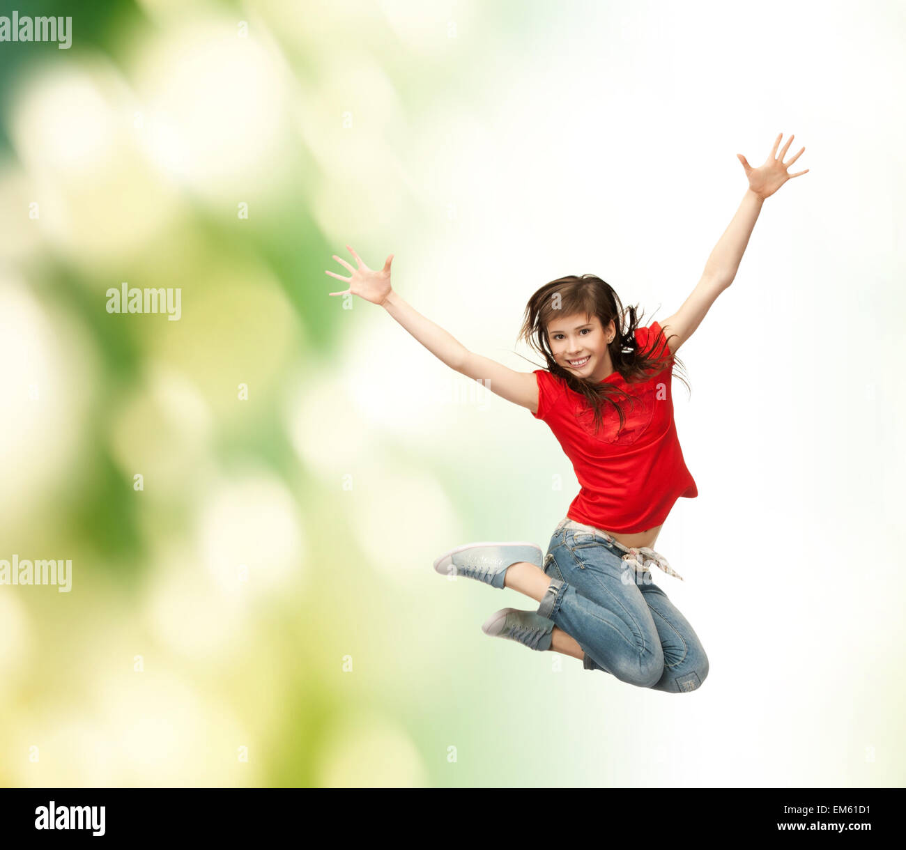 smiling girl jumping Stock Photo - Alamy