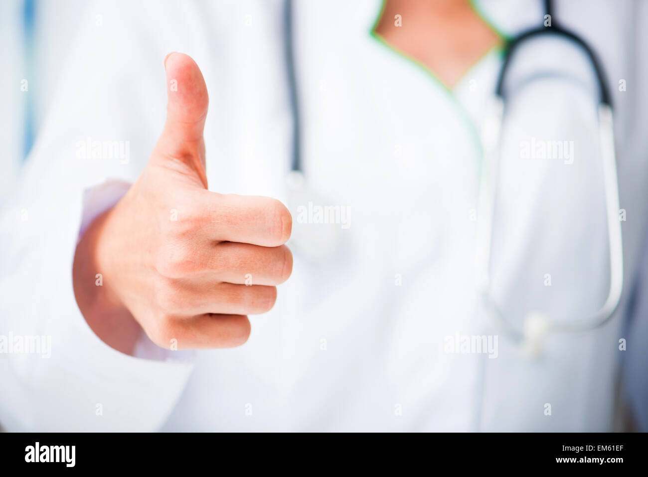 Doctor with thumbs up Stock Photo - Alamy