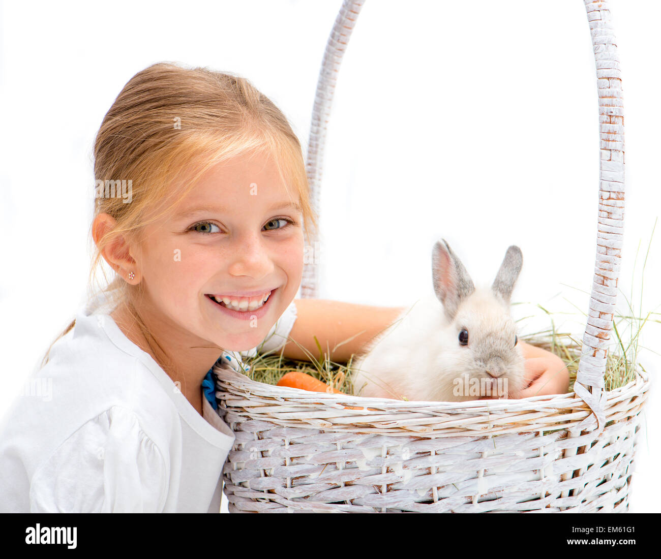 Little girl with a rabbit Stock Photo - Alamy