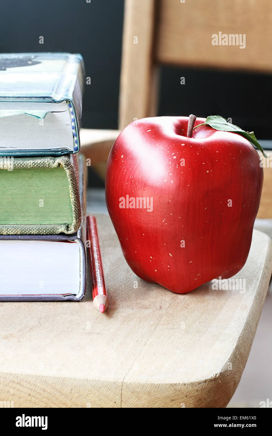 Apple on Desk Stock Photo - Alamy