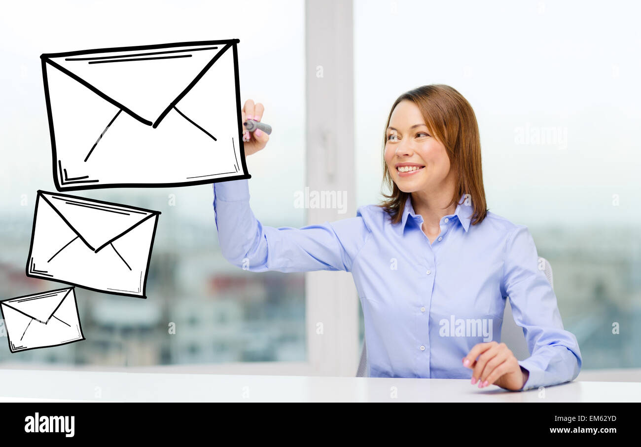 businesswoman drawing envelope Stock Photo - Alamy