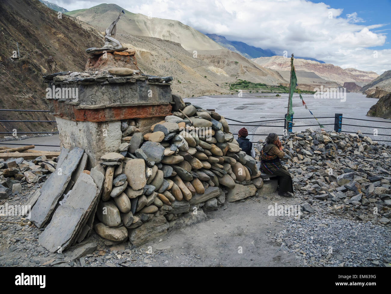 Nepal, Upper Mustang, Kali Gandaki gorge, People sitting next to ...