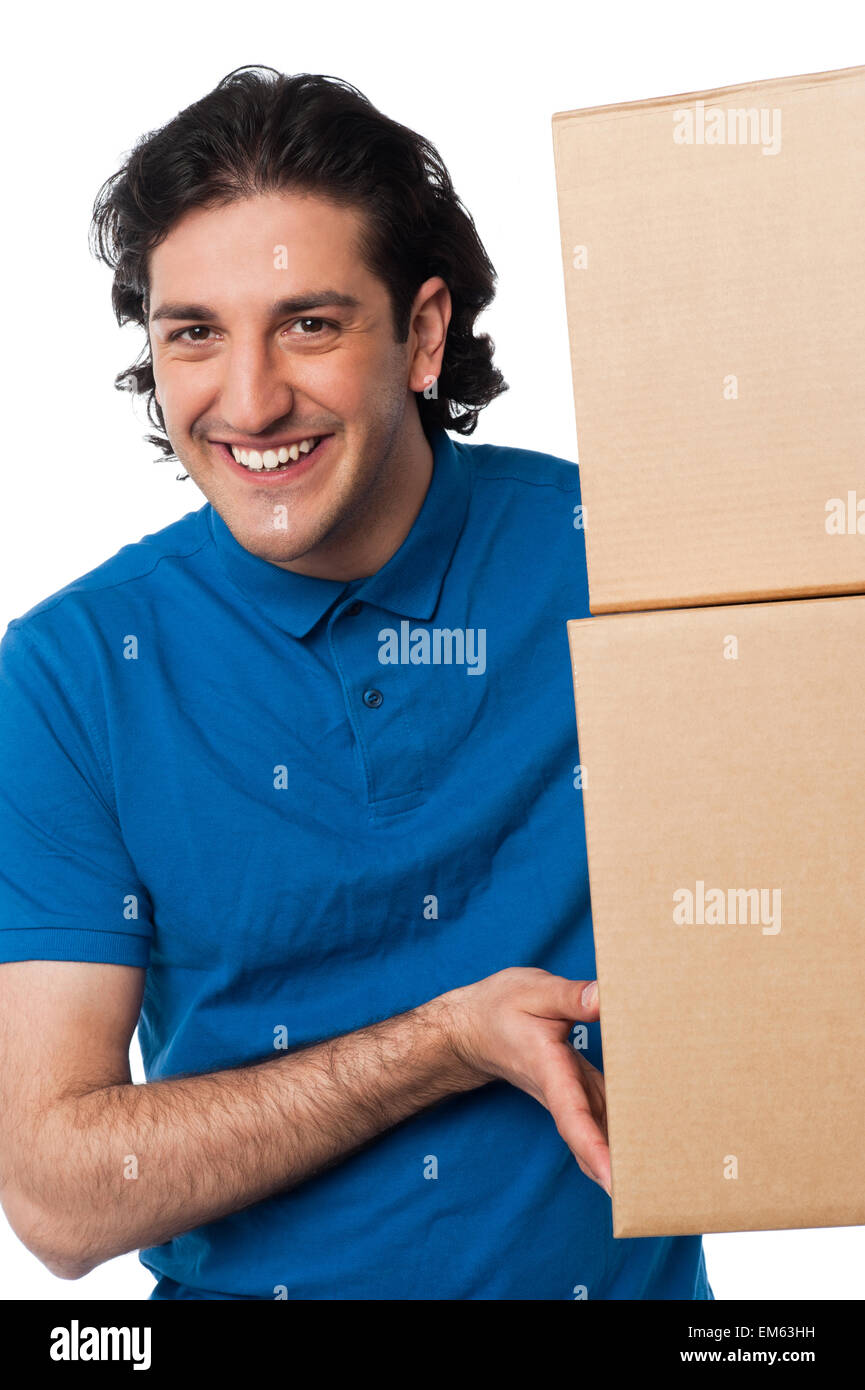 Man carrying couple of cardboard boxes Stock Photo - Alamy